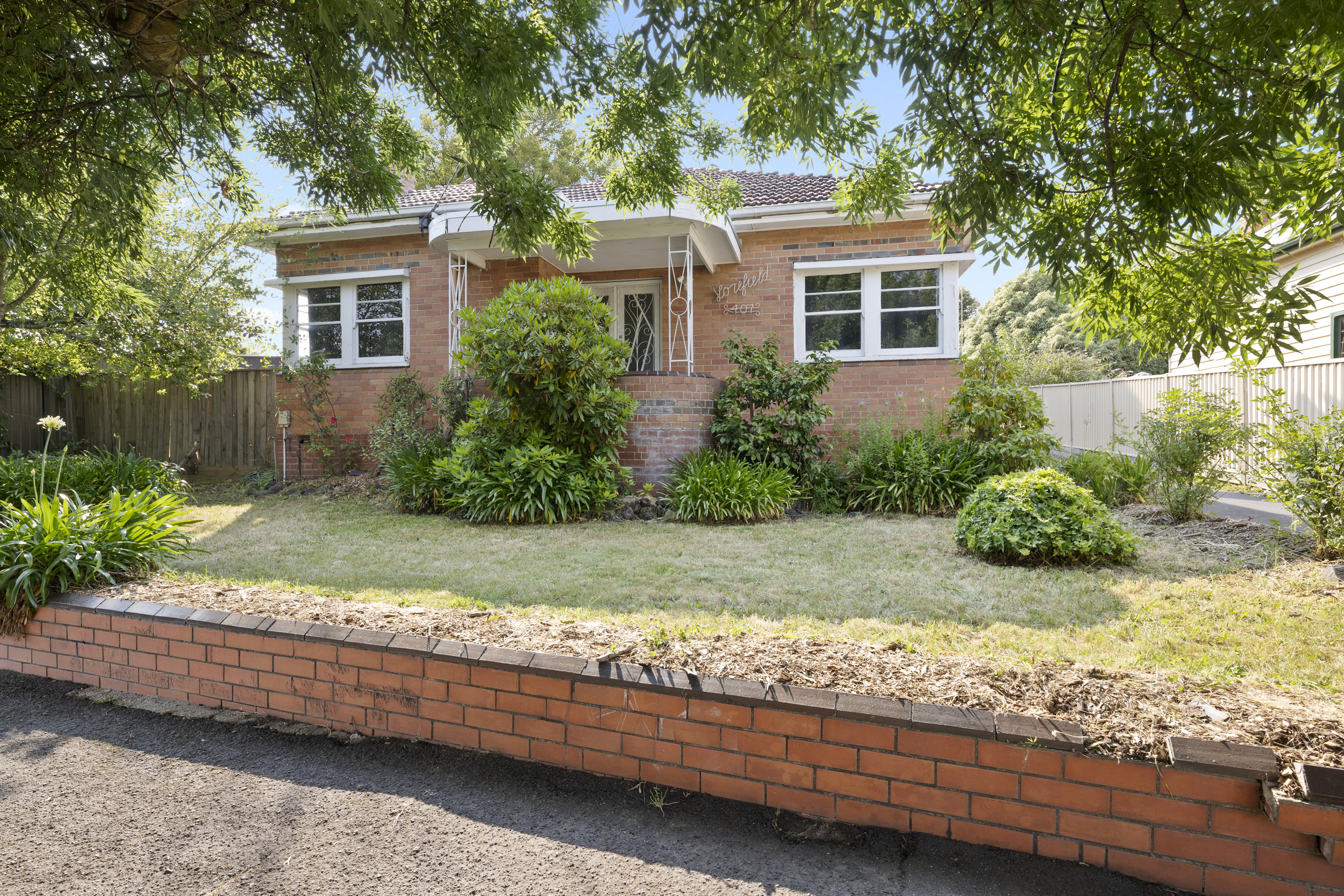 Charming Brick Home in Golden Point - BigginScott